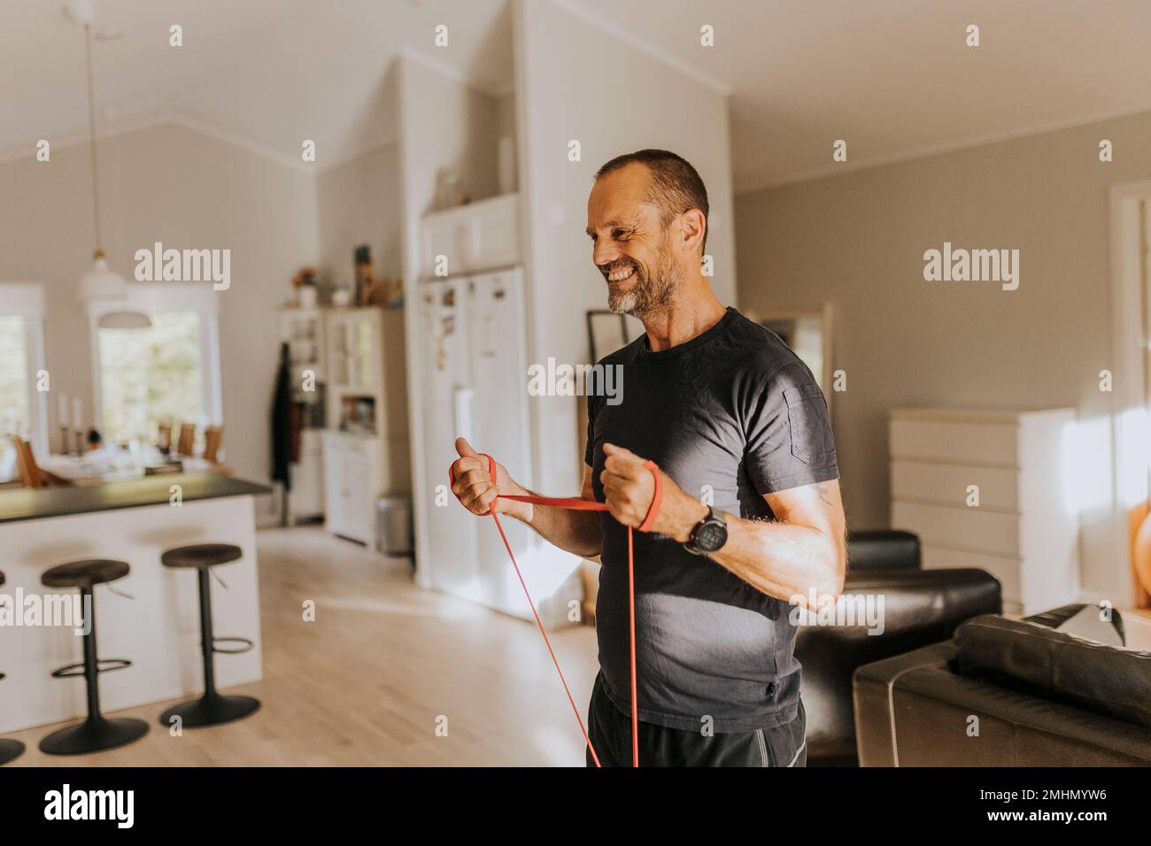 Man training at home Stock Photo - Alamy