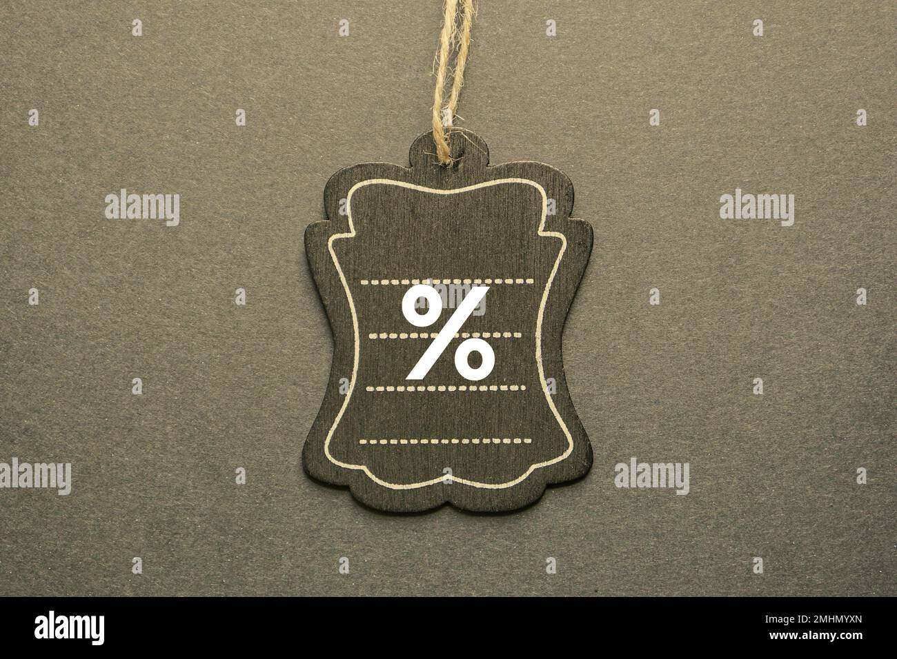 percent sign on the black price tag, black mockup background Stock ...