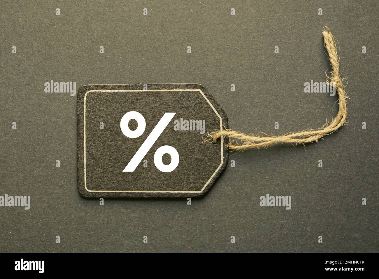 percent sign on the black price tag, black mockup background Stock ...