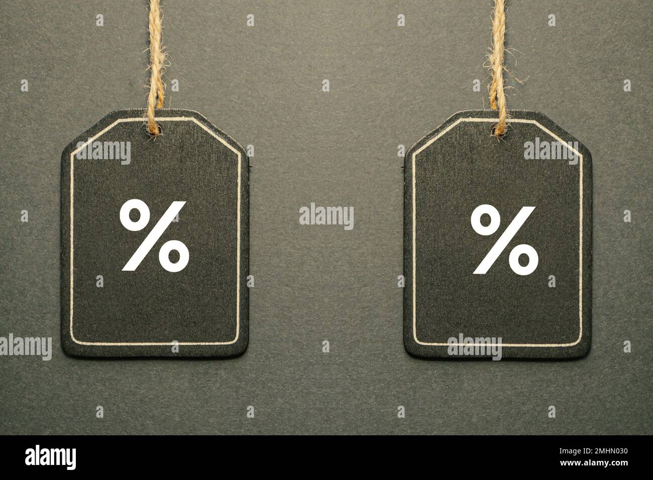 percent sign on the black price tag, black mockup background Stock ...