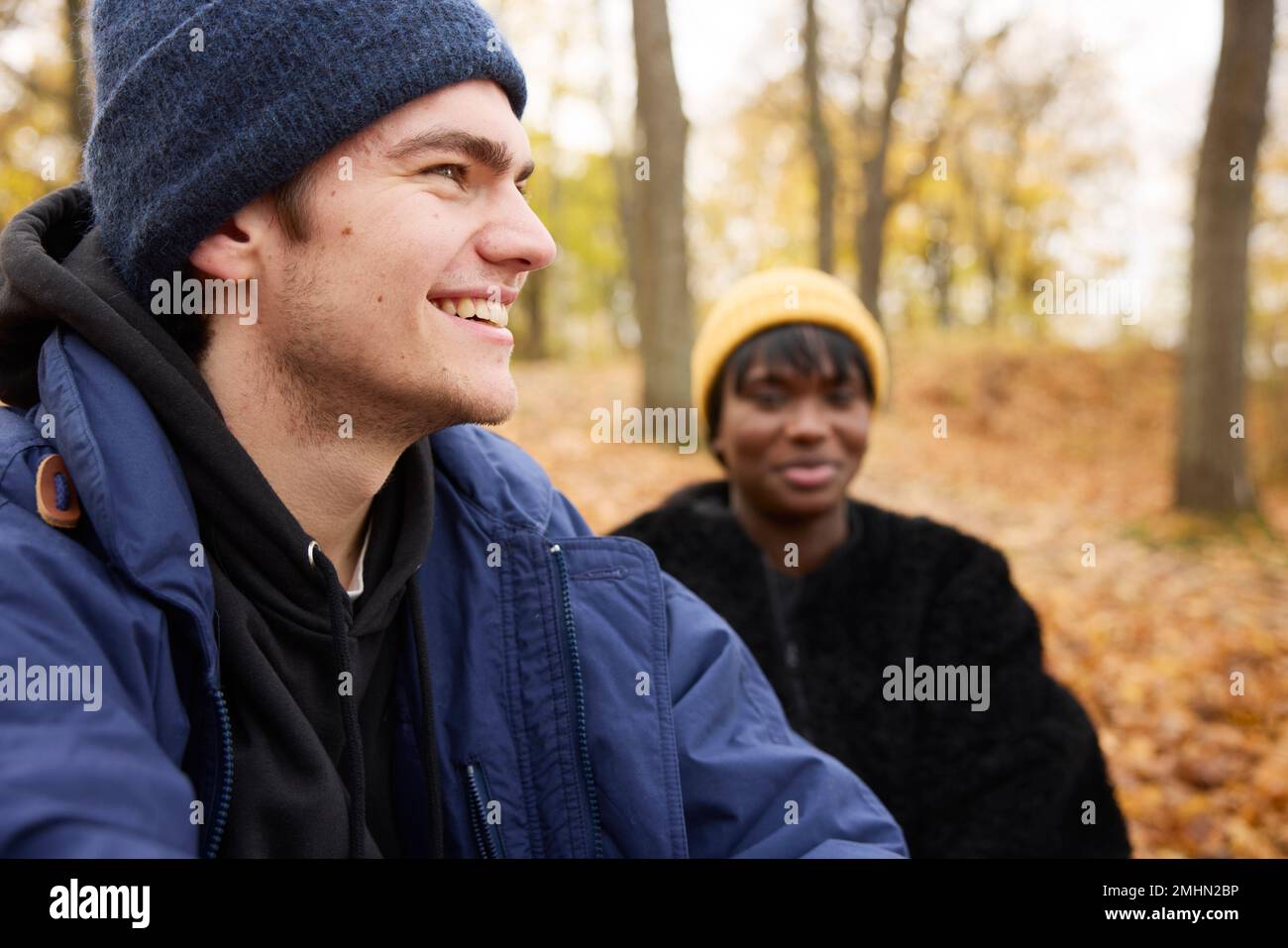 Smiling man looking away Stock Photo - Alamy