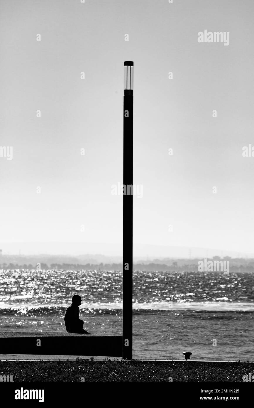 Old man staring out sea hi-res stock photography and images - Alamy