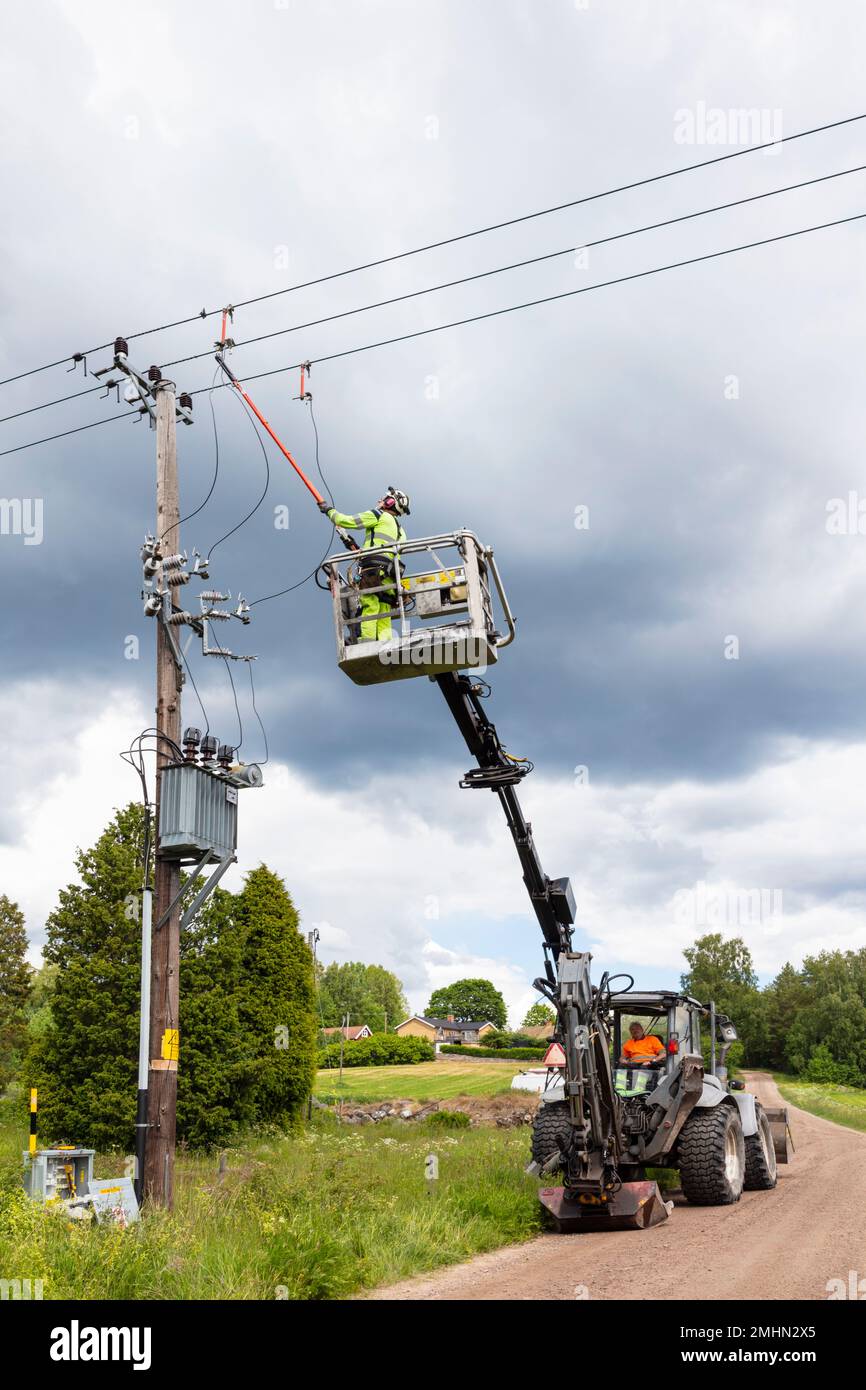 Worker pole hi-res stock photography and images - Alamy