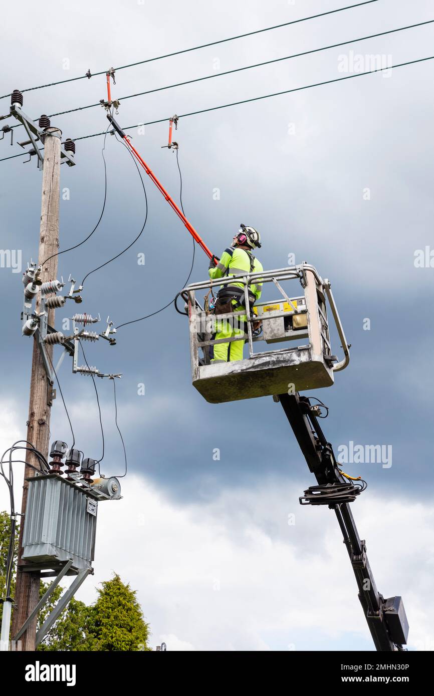 Worker pole hi-res stock photography and images - Alamy