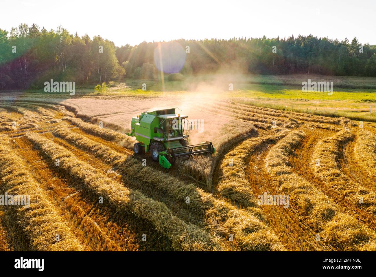Agricultural machine combine working on hi-res stock photography and ...