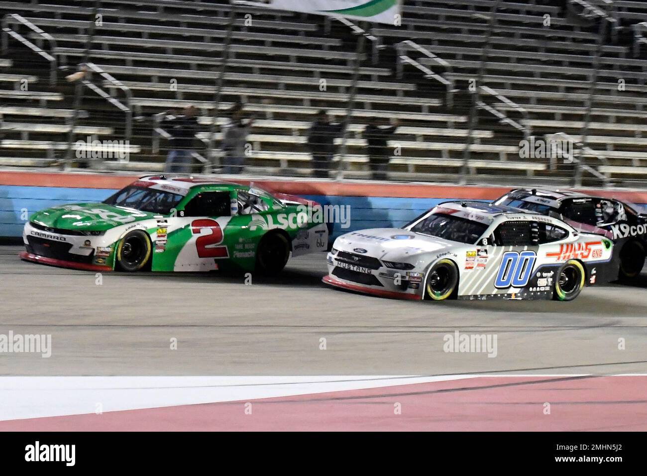 Tyler Reddick (2) and Cole Custer (00) head into the front stretch ...