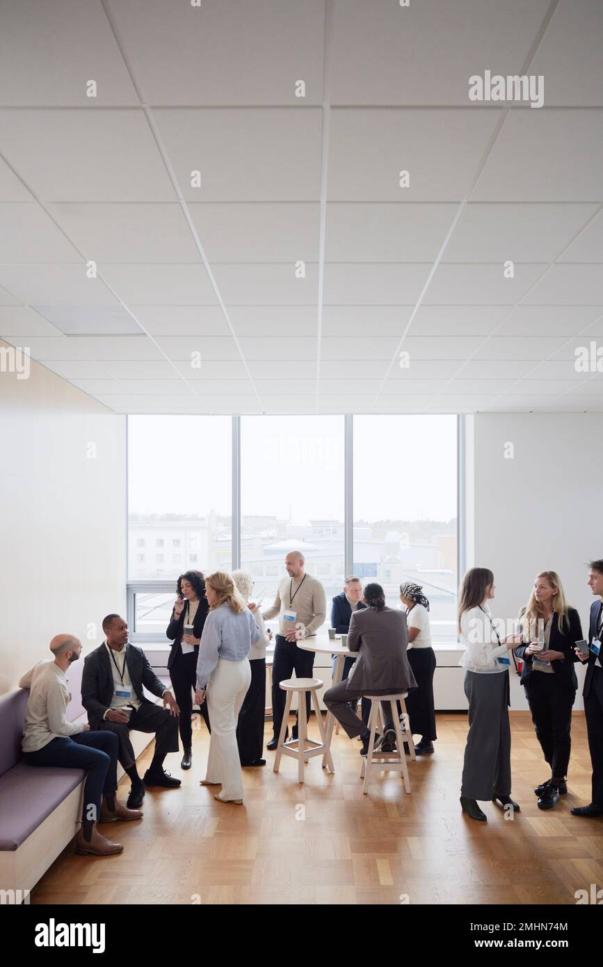 Business people talking together Stock Photo - Alamy