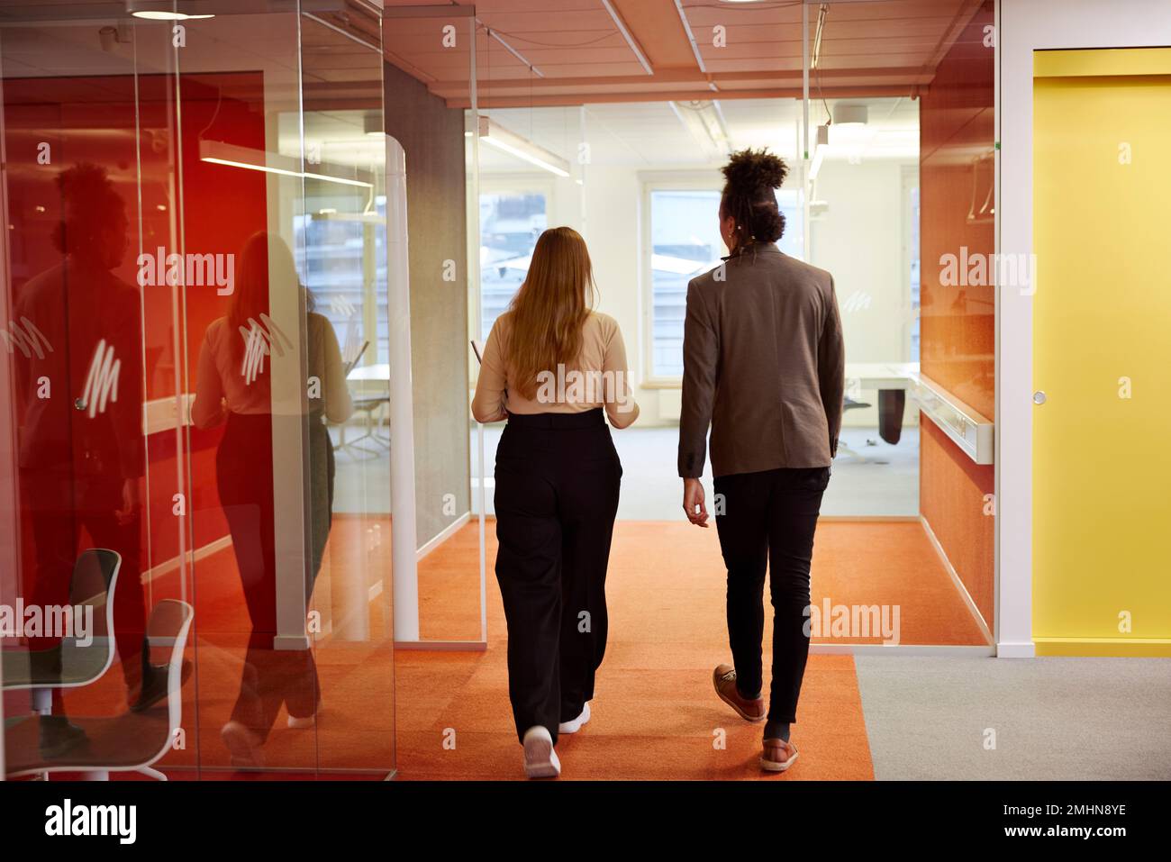Two people walking in an industry hi-res stock photography and images ...
