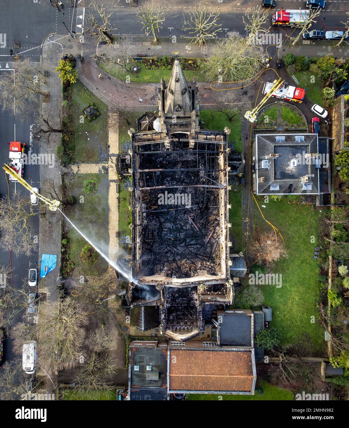 London, UK. Jan 27th 2023. Aerial view of burnt church as firefighters ...