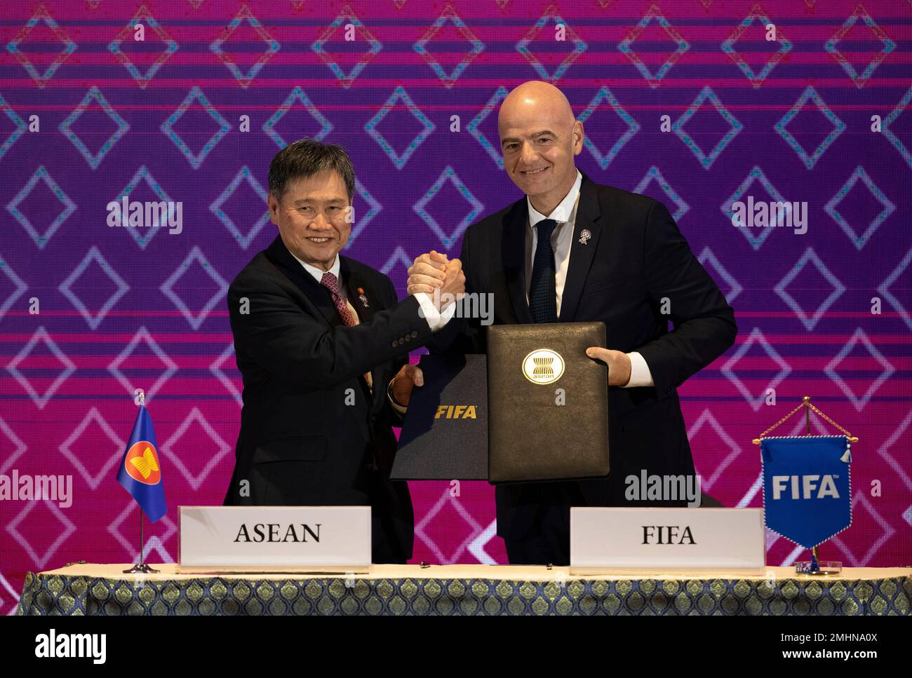 ASEAN Secretary-General Dato Lim Jock Hoi, left, and FIFA president ...