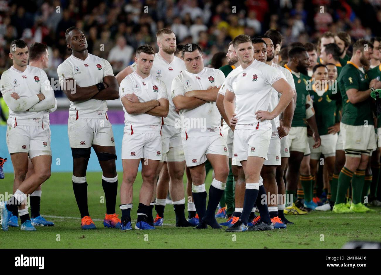 England players wait to receive their runners-up medals following their ...