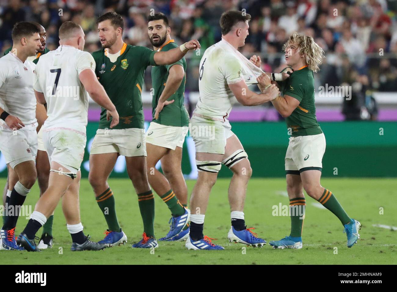 South Africa's Faf de Klerk, right, and England's Tom Curry, second ...