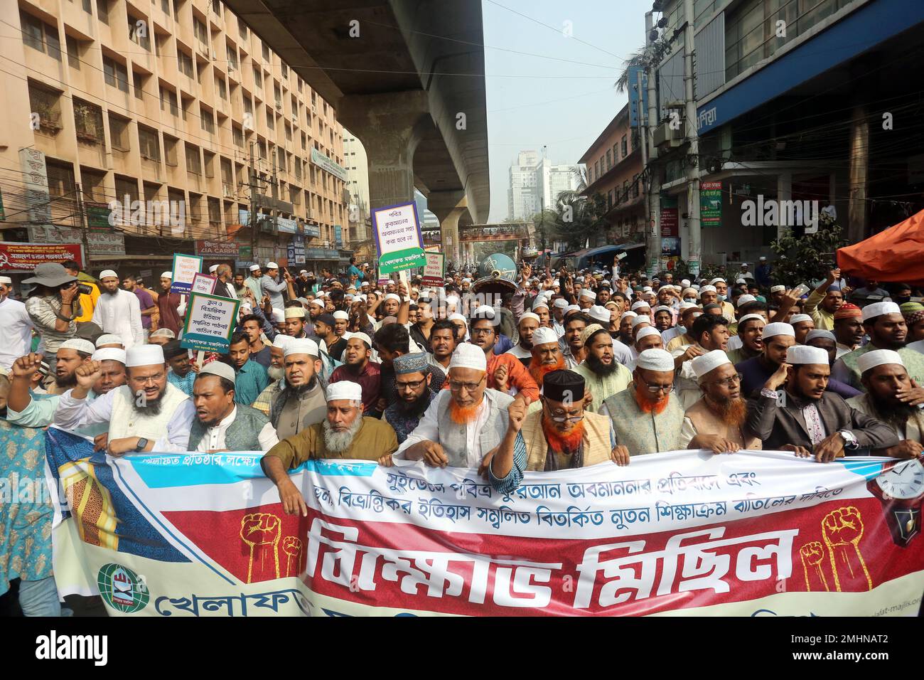 Activists of the Khilafat Majlish, an Islamic political group, stage a ...