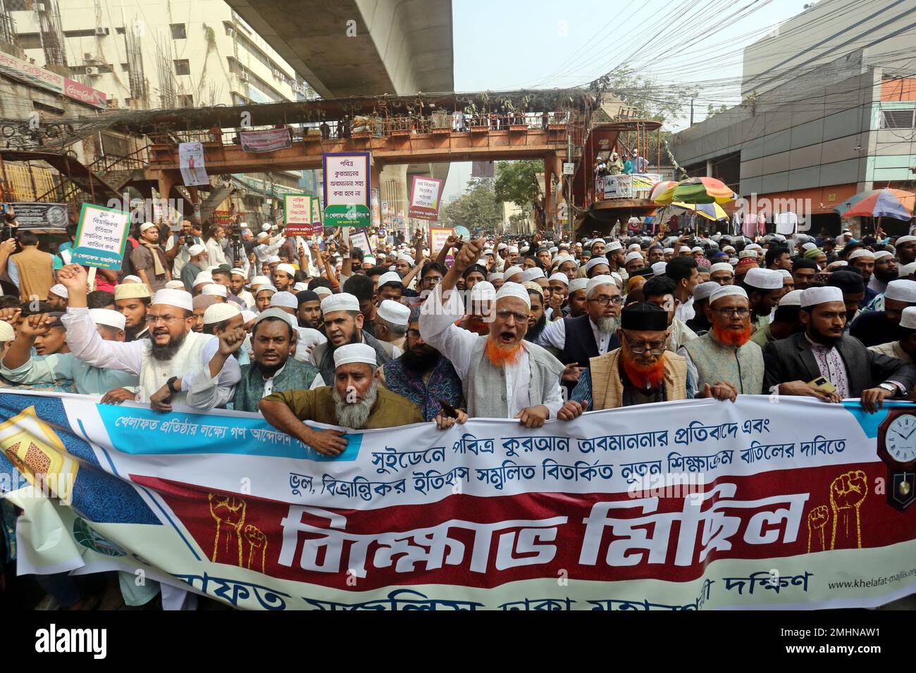 Activists of the Khilafat Majlish, an Islamic political group, stage a ...