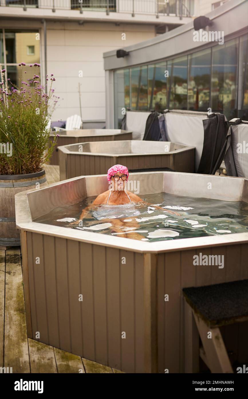 Woman relaxing in hot tub hi-res stock photography and images - Alamy