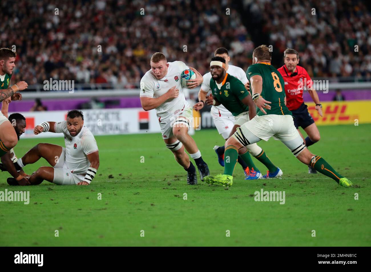 England's Sam Underhill is chased by South Africa defenders during the ...