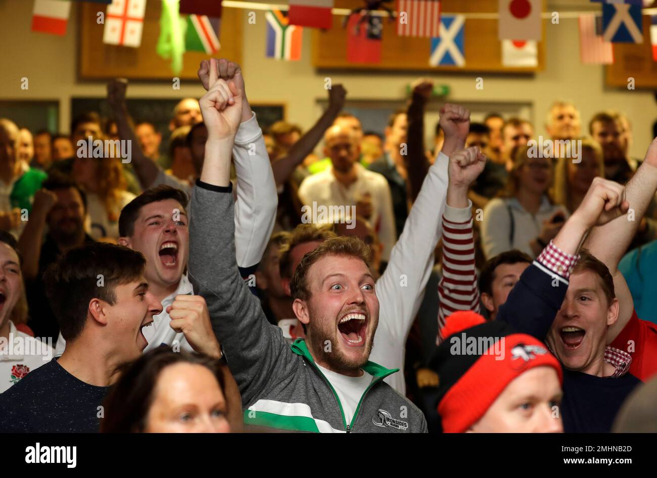 Rugby fans react as they watch the Rugby World Cup final between ...