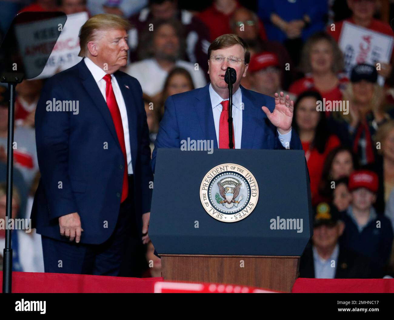 President Donald Trump listens to Mississippi Republican nominee for ...