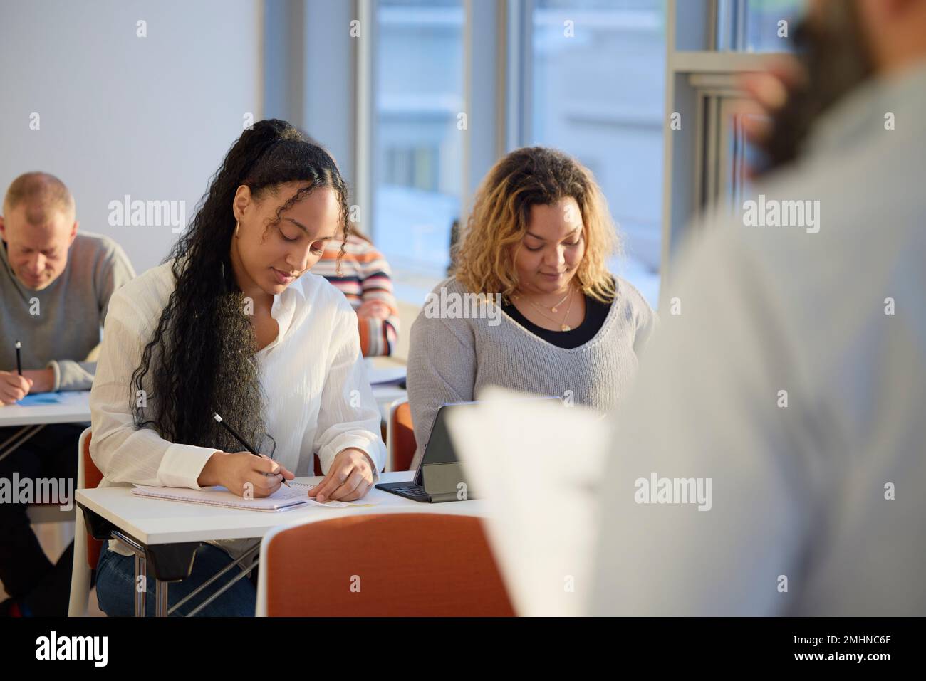 Business people at workshop Stock Photo - Alamy