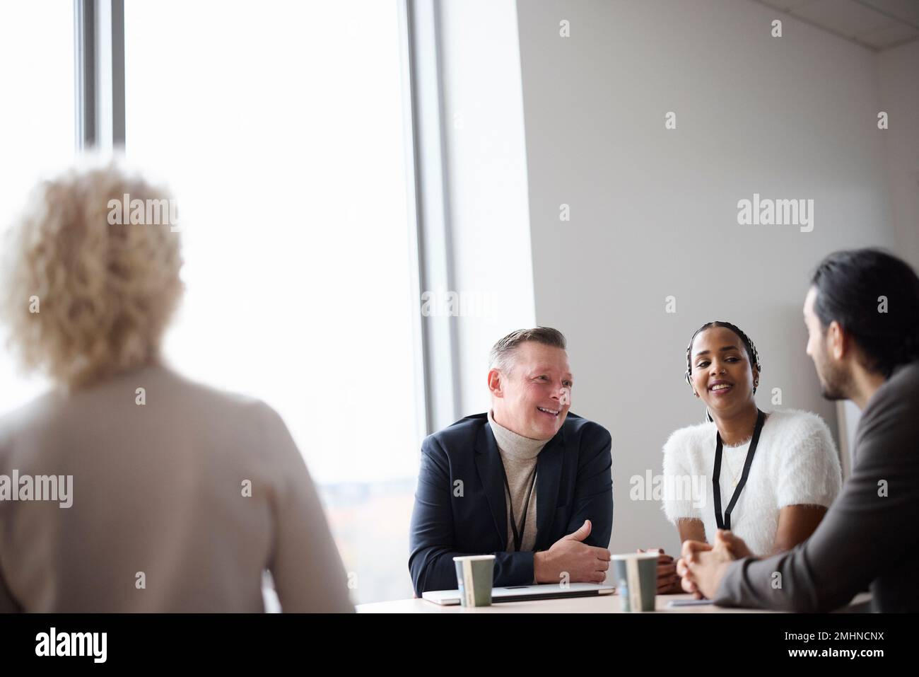 Business people talking during coffee break Stock Photo - Alamy