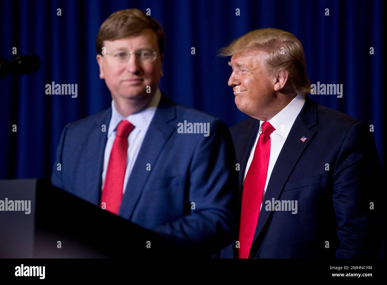 President Donald Trump welcomes Mississippi Lt. Gov. Tate Reeves, left ...