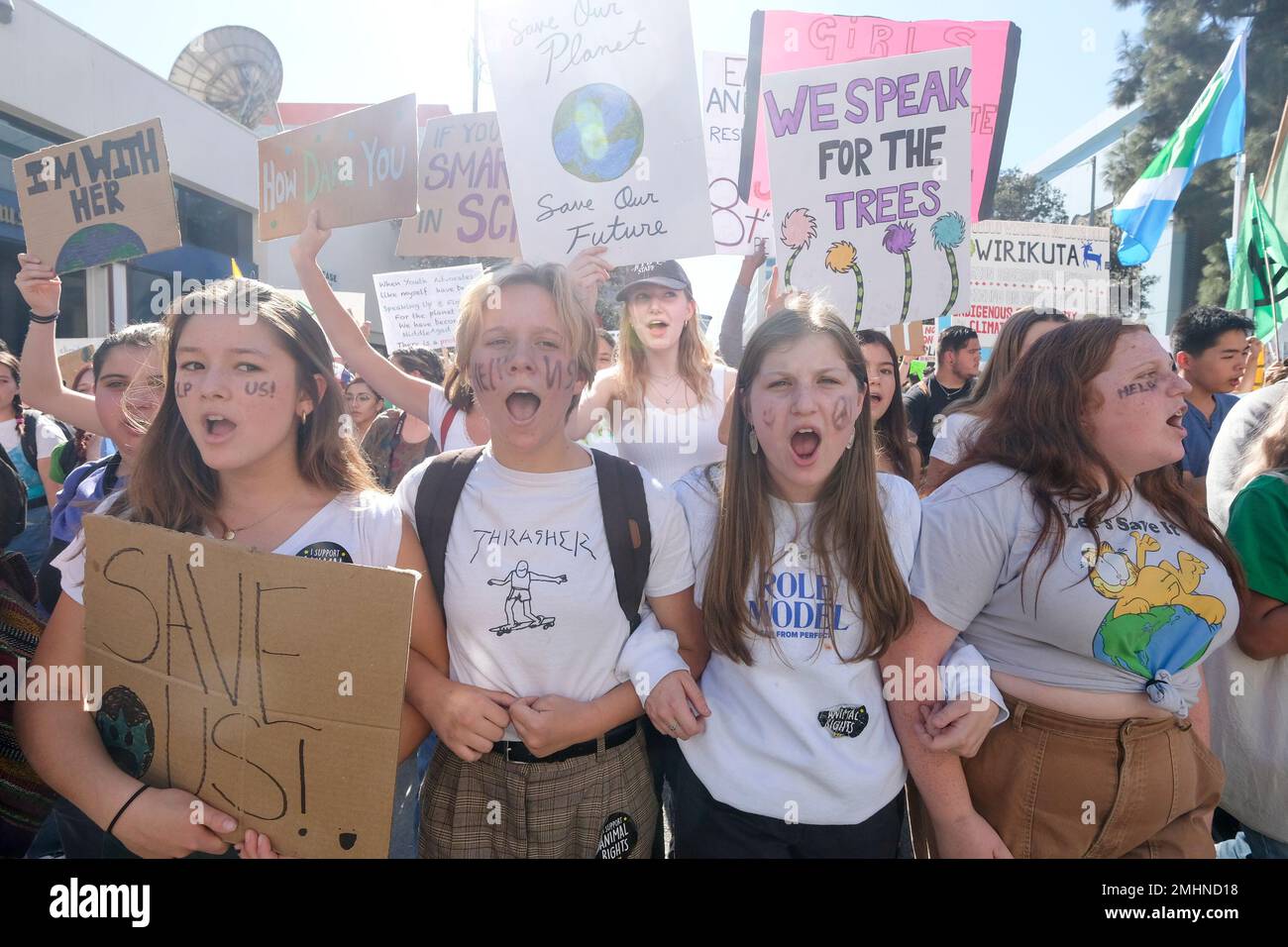 Climate activists participate in a student-led climate change march in ...