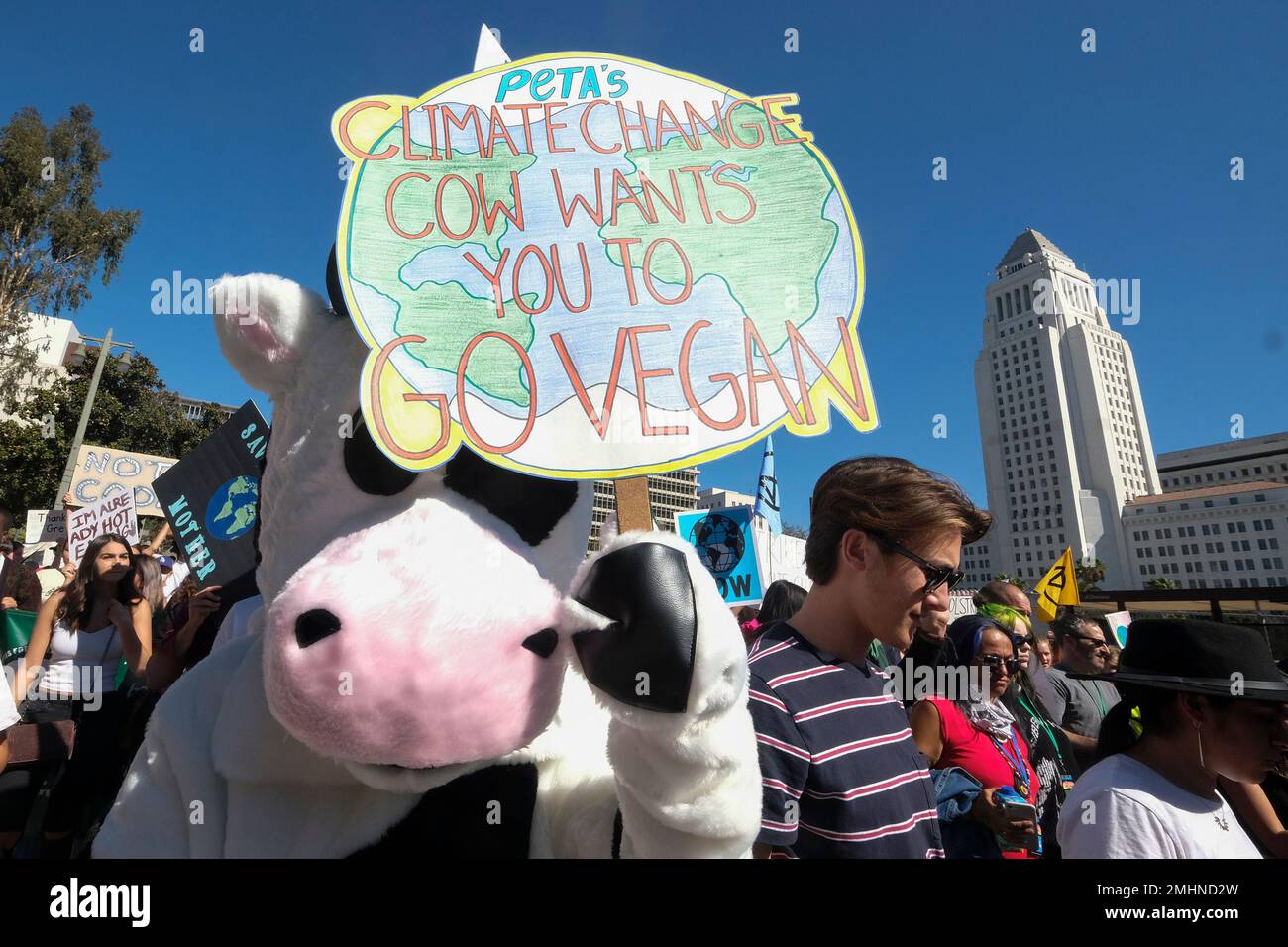 Climate activists participate in a student-led climate change march in ...