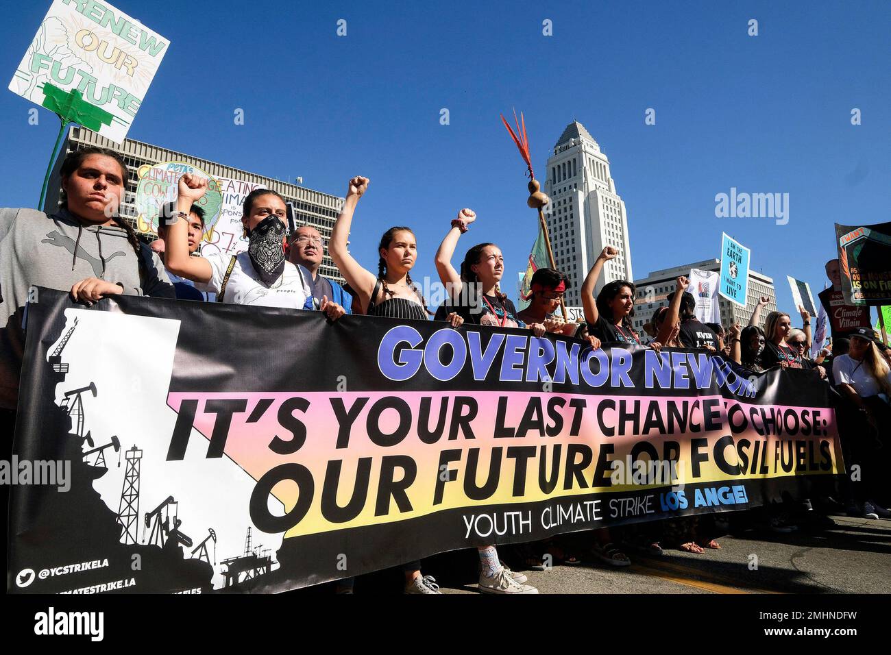 Climate activists participate in a student-led climate change march in ...