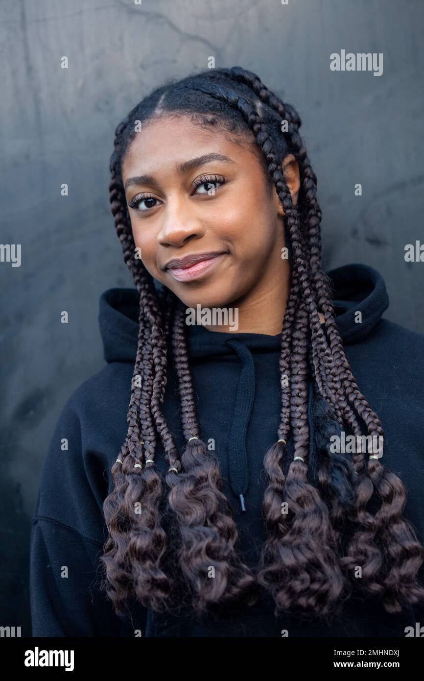 Portrait of beautiful woman with braided hair Stock Photo - Alamy