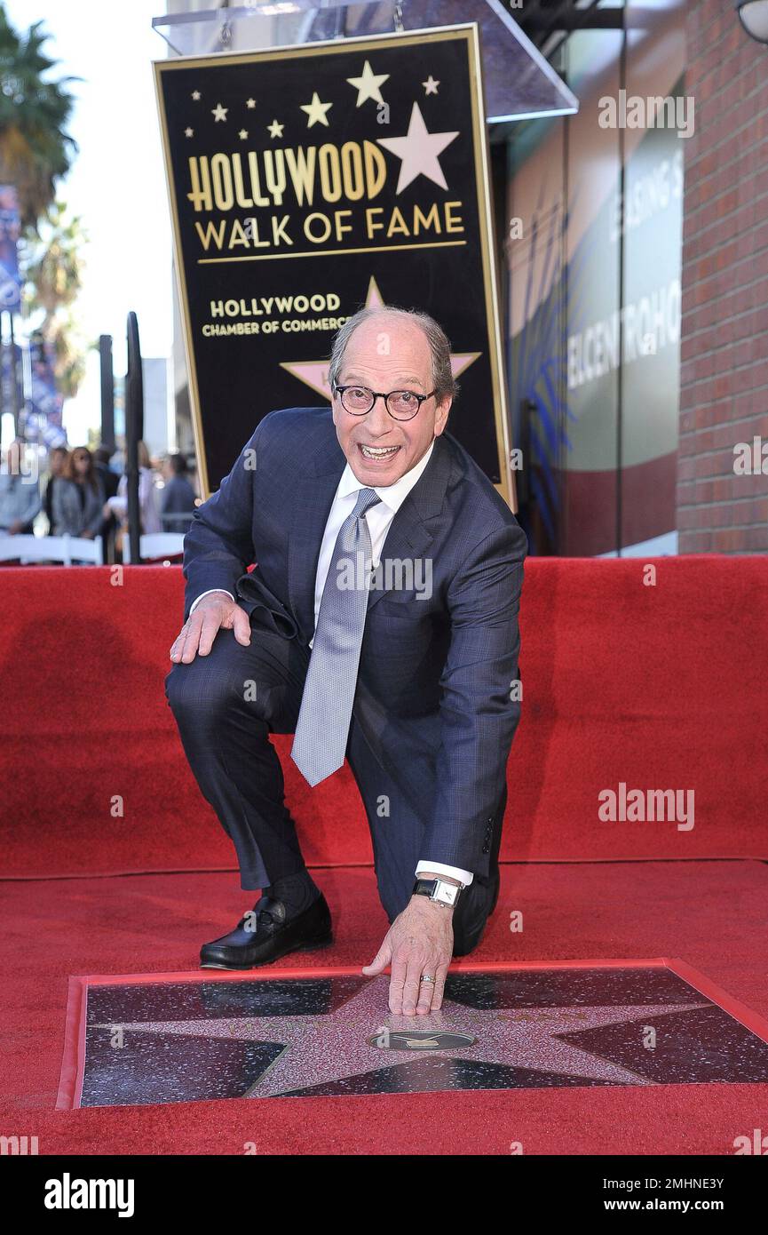 Harry Friedman poses for photos at a ceremony honoring him with a star ...