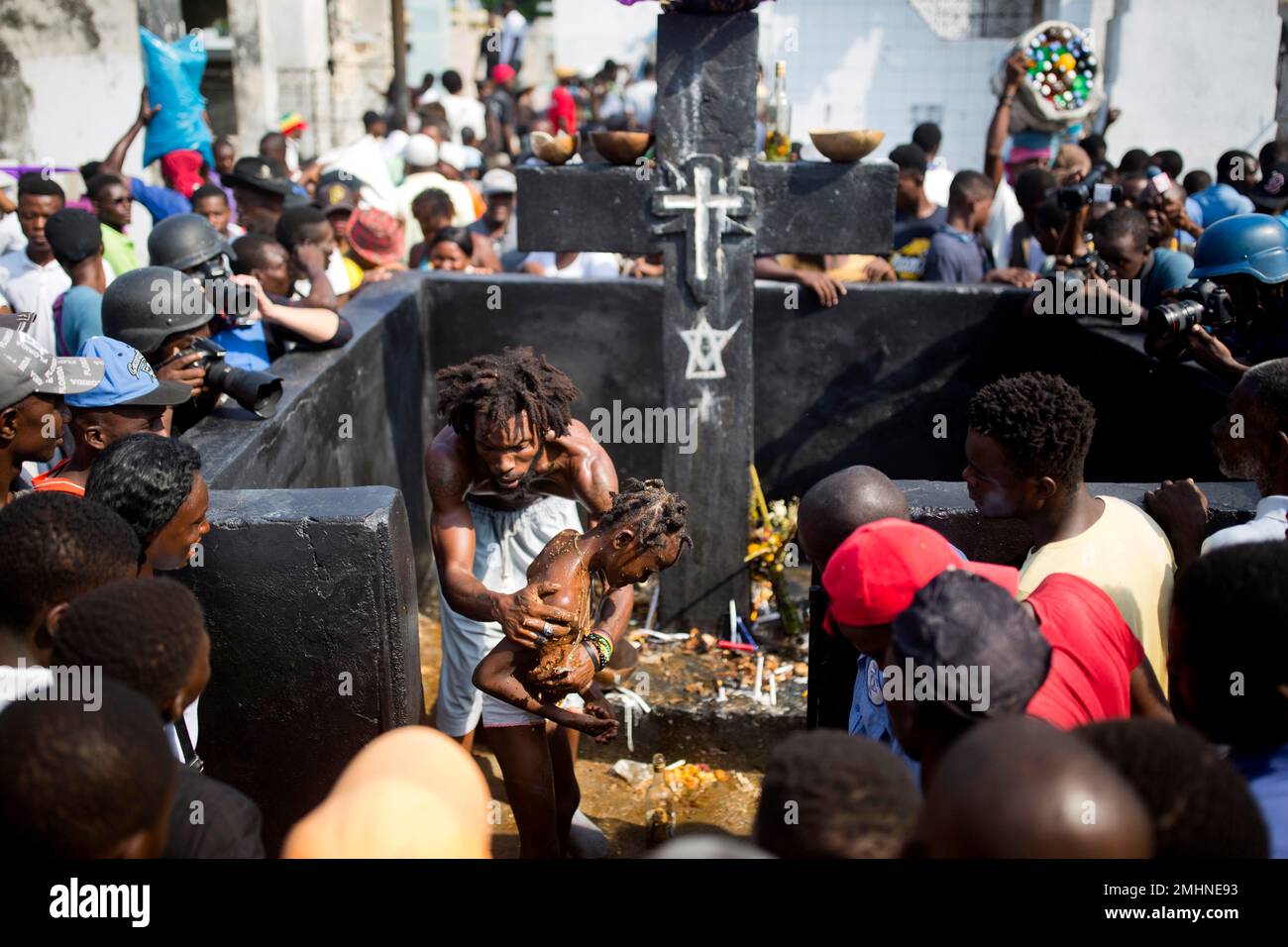 A voodoo priest who is supposed to be possessed with a Gede spirit ...