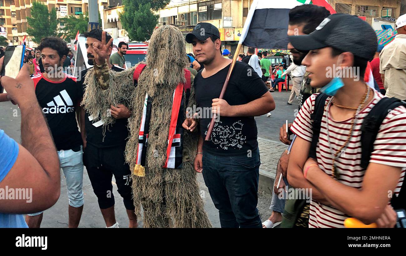 Anti-government protesters take photos with Ahmad Fadel, a protester ...