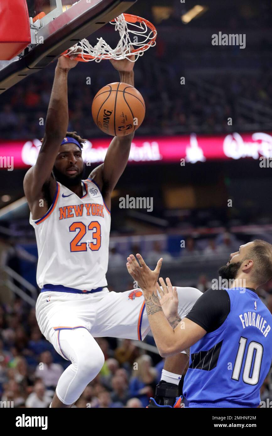 New York Knicks' Mitchell Robinson (23) dunks the ball over Orlando ...