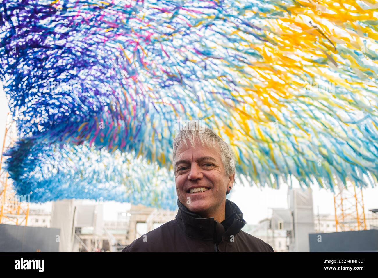 Artist Patrick Shearn poses for media in under his skynet artwork ...