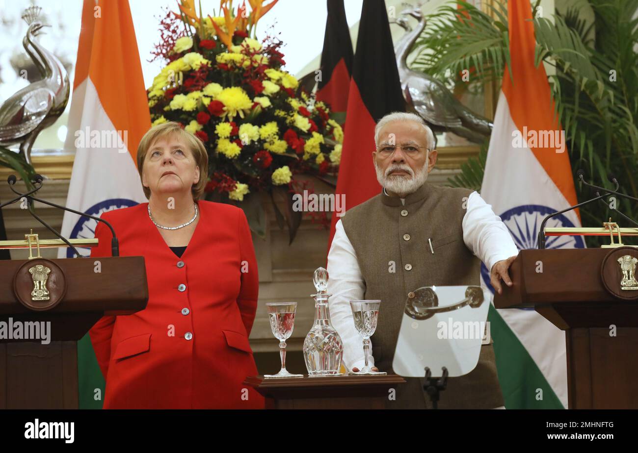 Indian Prime Minister Narendra Modi, right, with German Chancellor ...