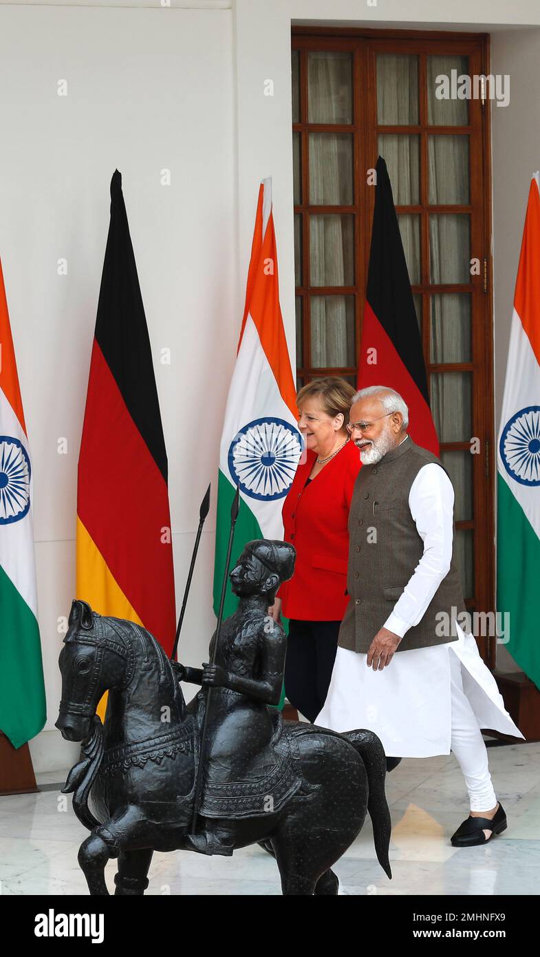 Indian Prime Minister Narendra Modi, right, and German Chancellor ...