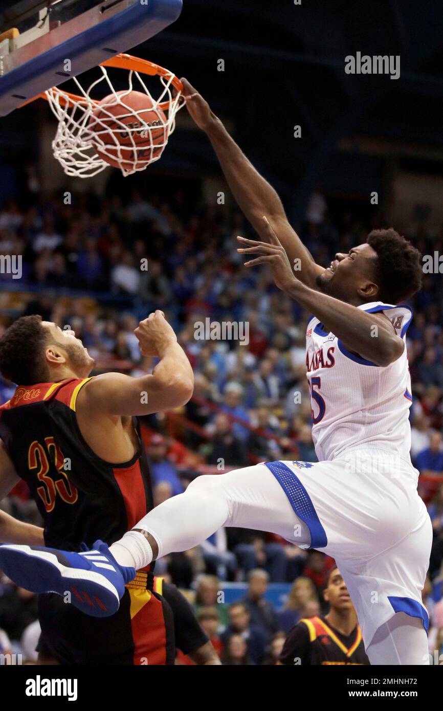 Kansas center Udoka Azubuike (35) dunks over Pittsburg State forward ...