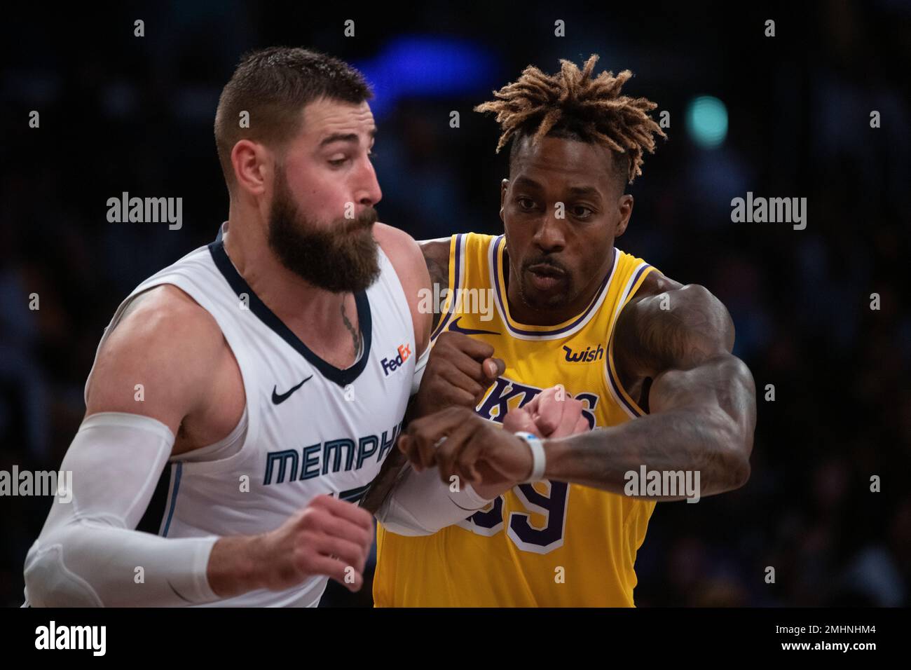 Los Angeles Lakers center Dwight Howard, right, fights for a position ...