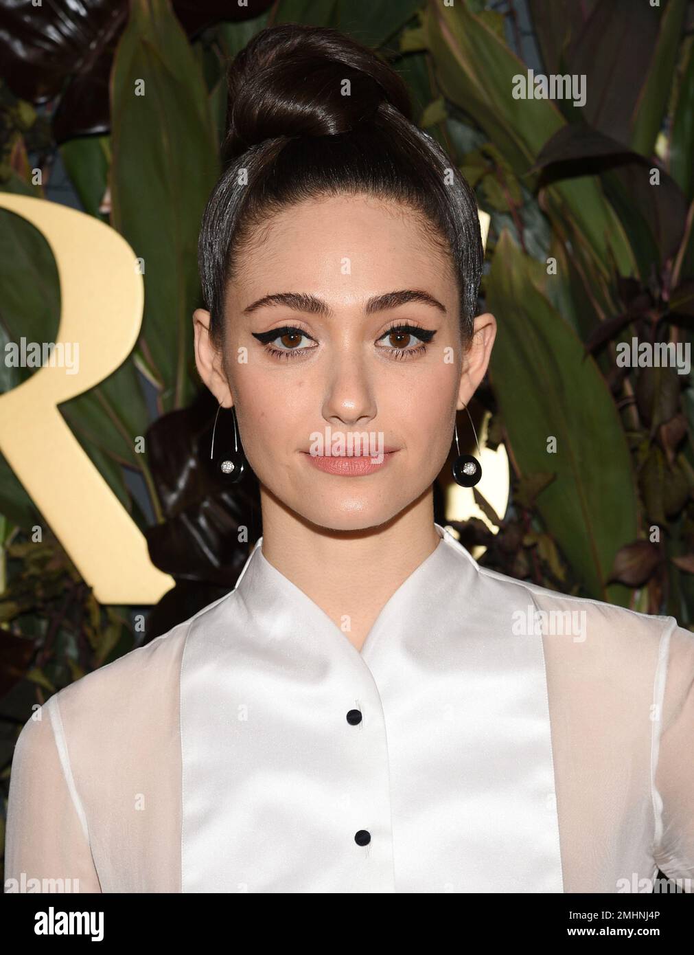 Actress Emmy Rossum attends the fourth annual Women's Wear Daily WWD ...