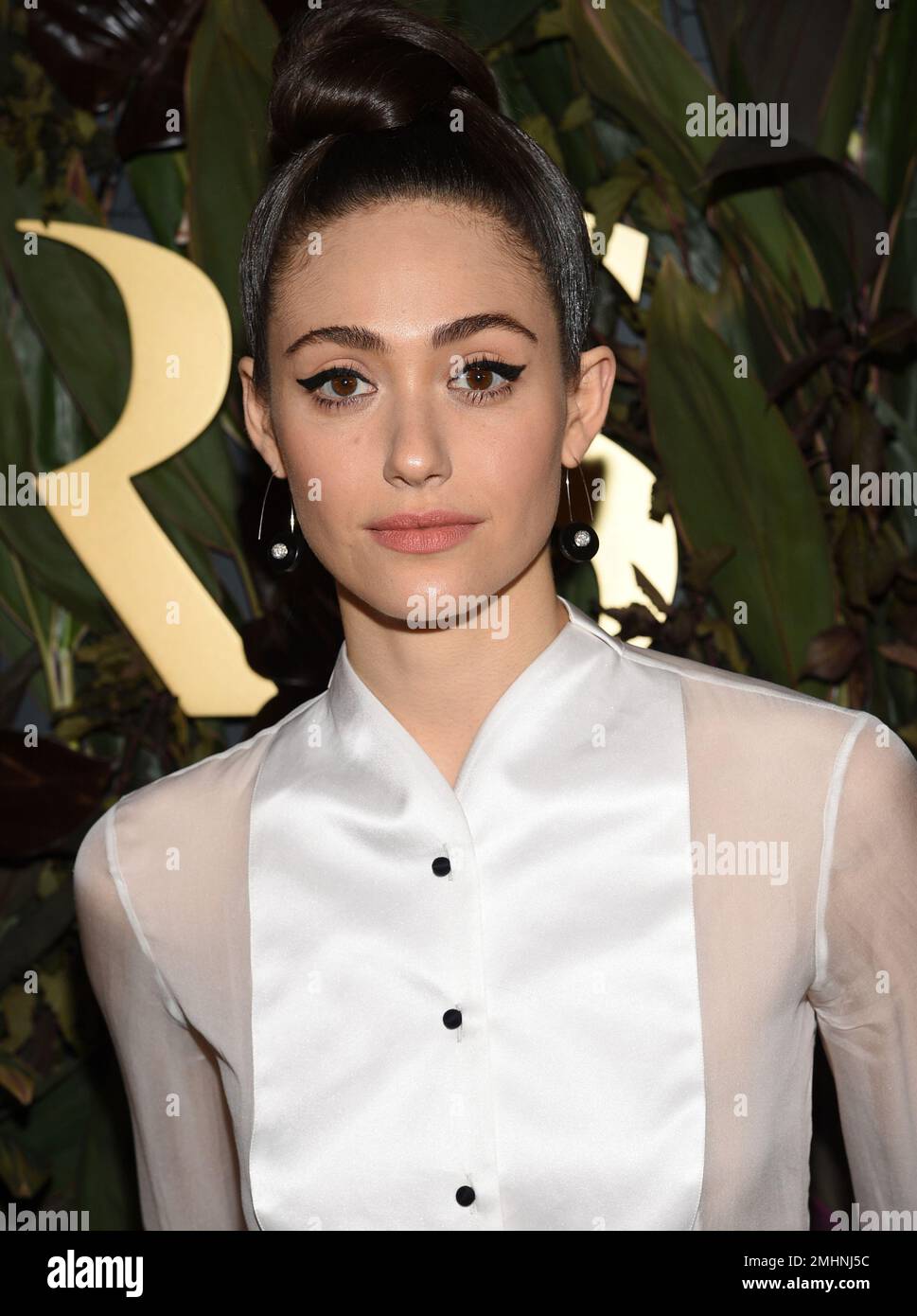 Actress Emmy Rossum attends the fourth annual Women's Wear Daily WWD ...