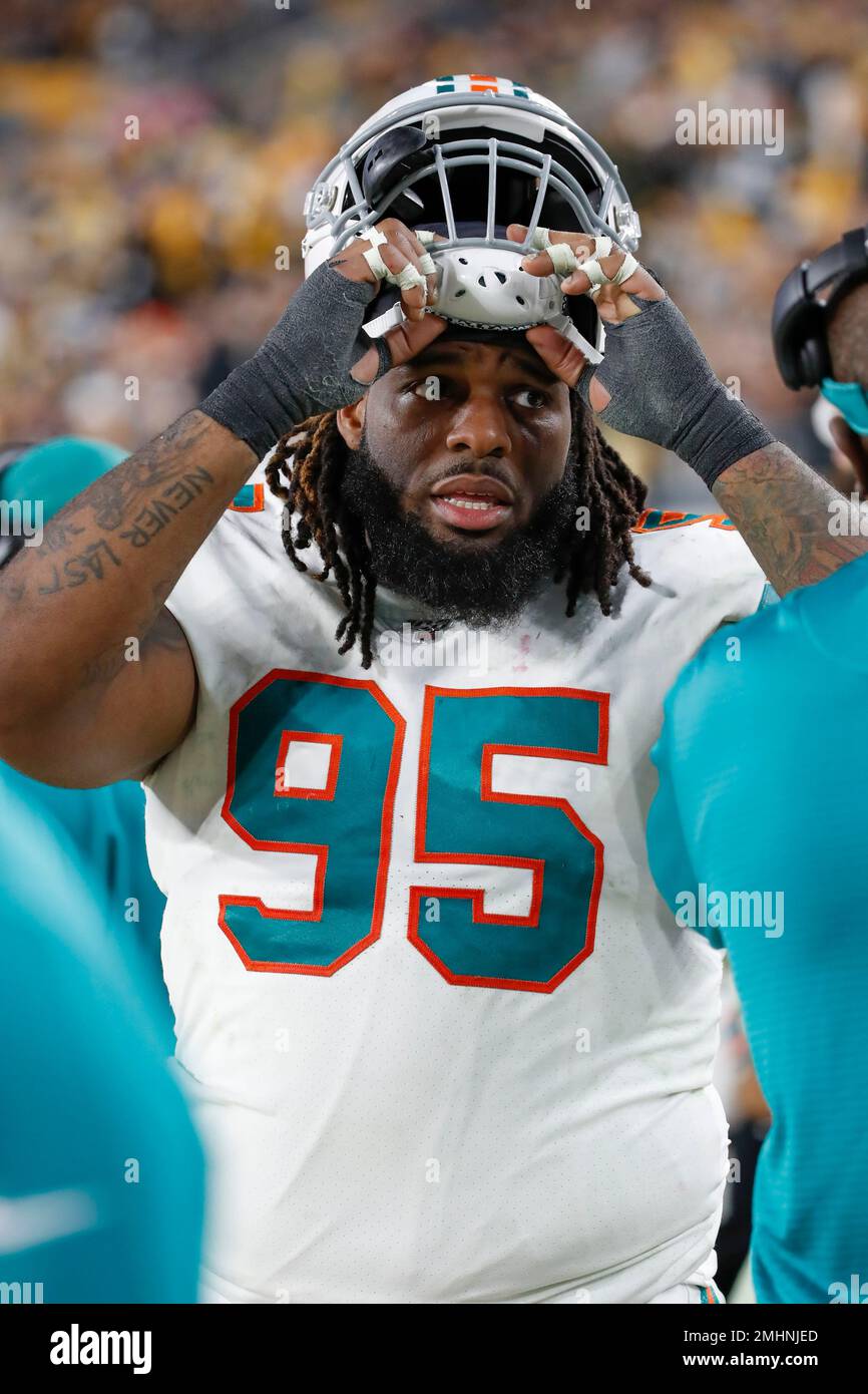 Miami Dolphins defensive tackle John Jenkins (95) plays against the ...