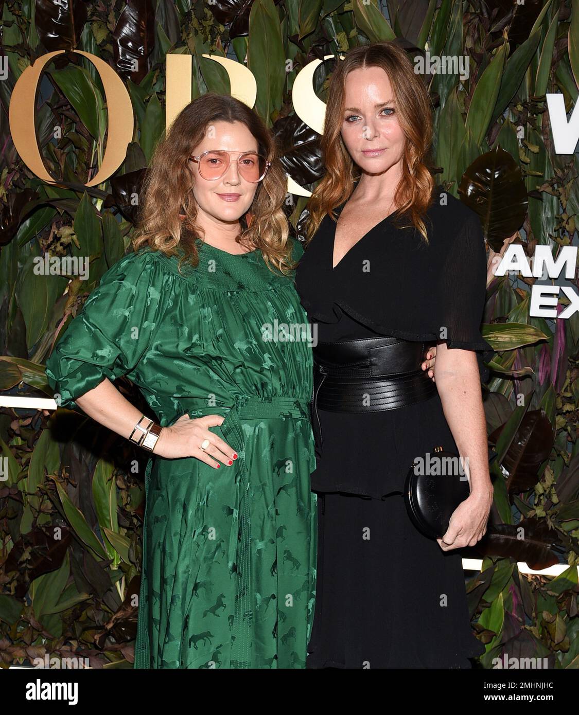 Actress Drew Barrymore, left, and honoree Stella McCartney pose ...