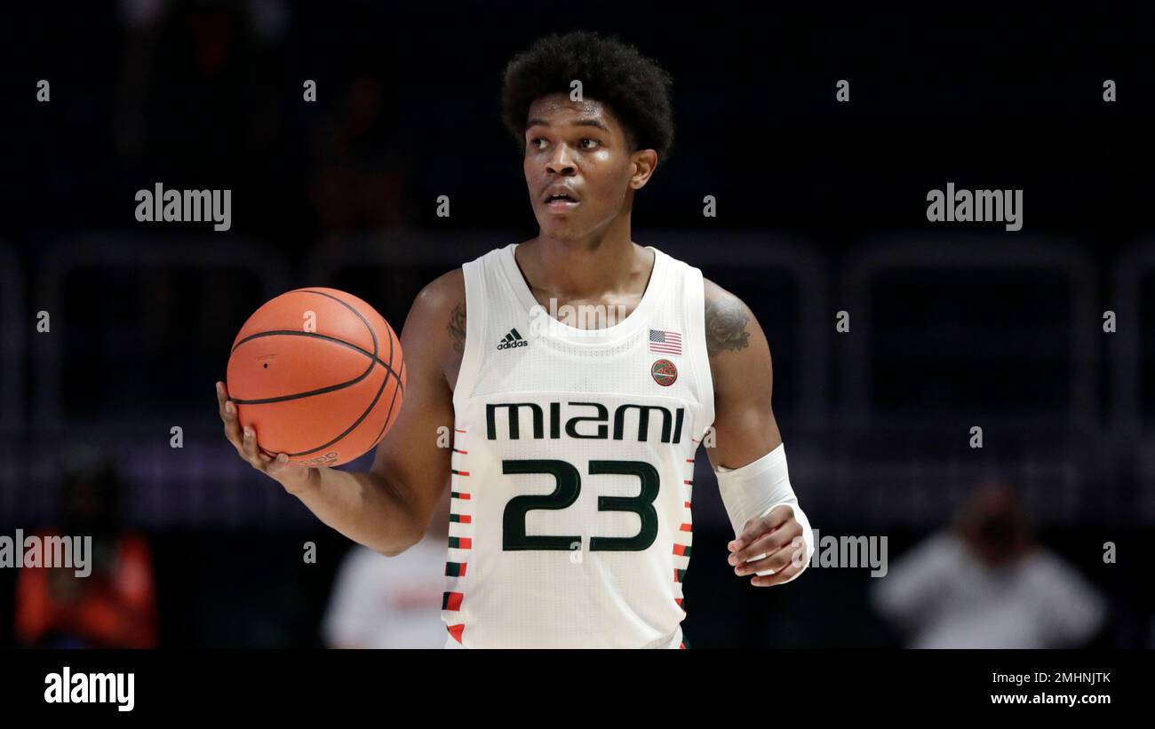 Miami guard Kameron McGusty (23) moves the ball down the court during ...