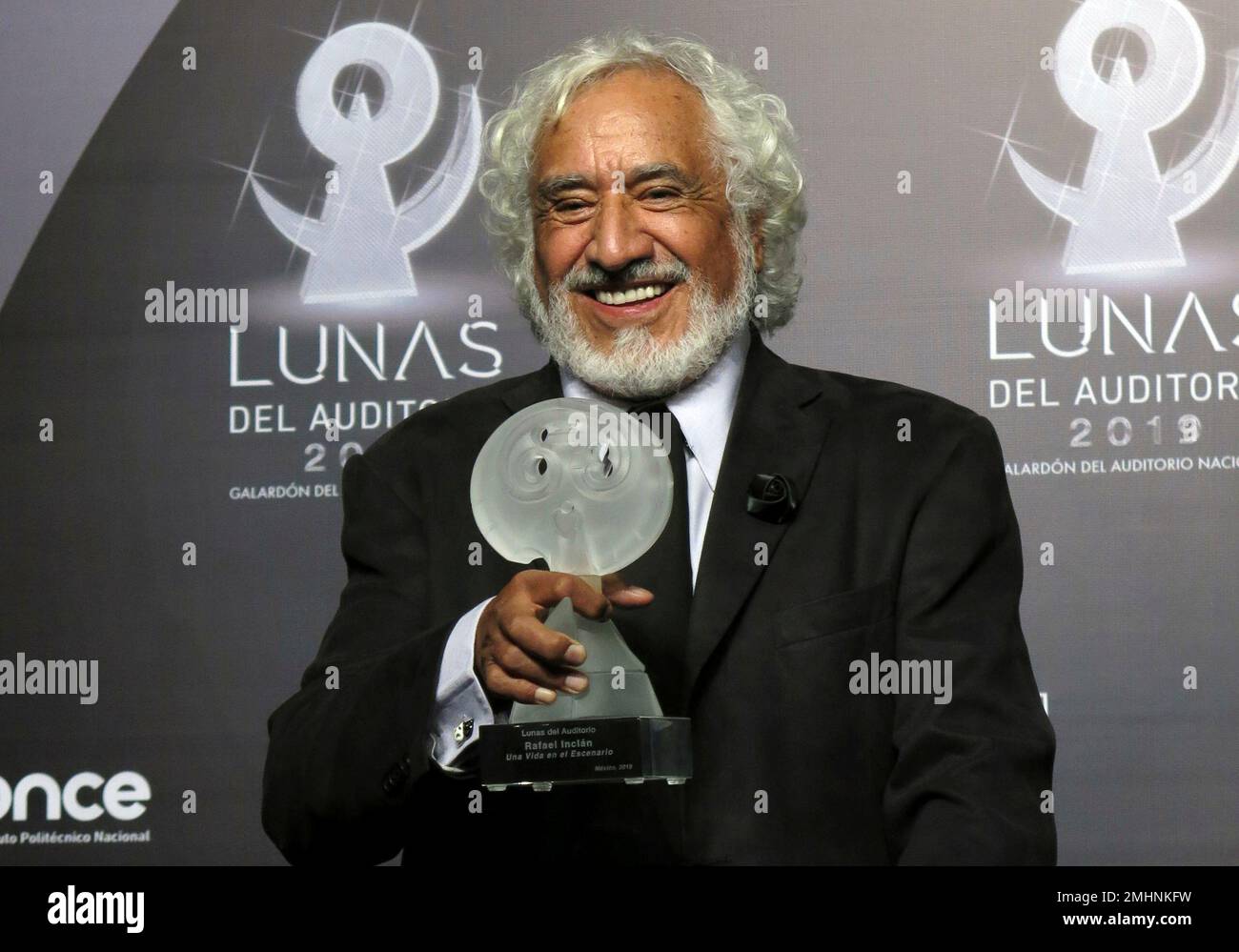 Mexican actor Rafael Inclan poses with his Lifetime Achievement award ...