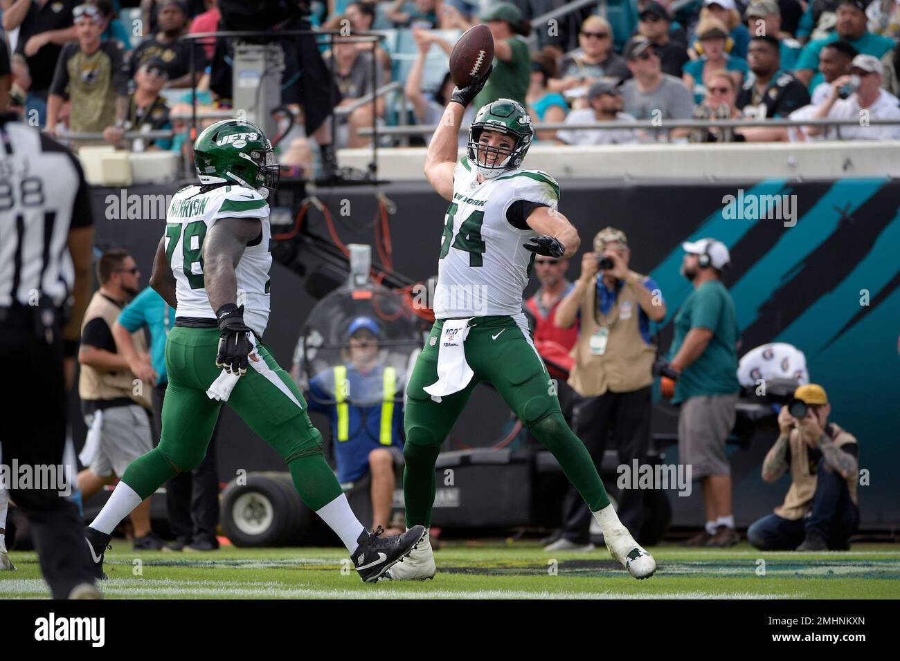 New York Jets tight end Ryan Griffin (84) spikes the ball in the end ...