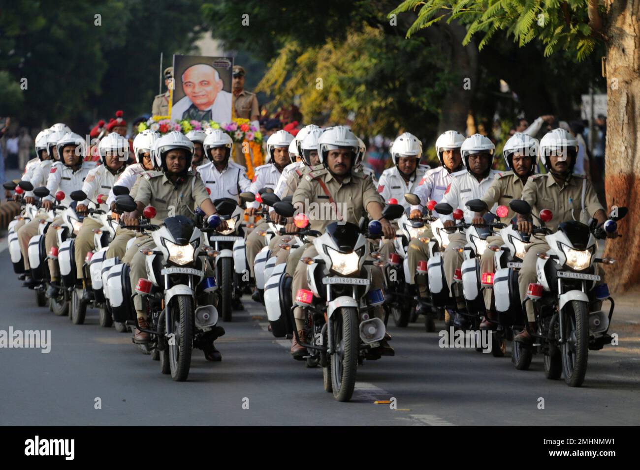 Indian policemen participate in a parade to celebrate National Unity ...