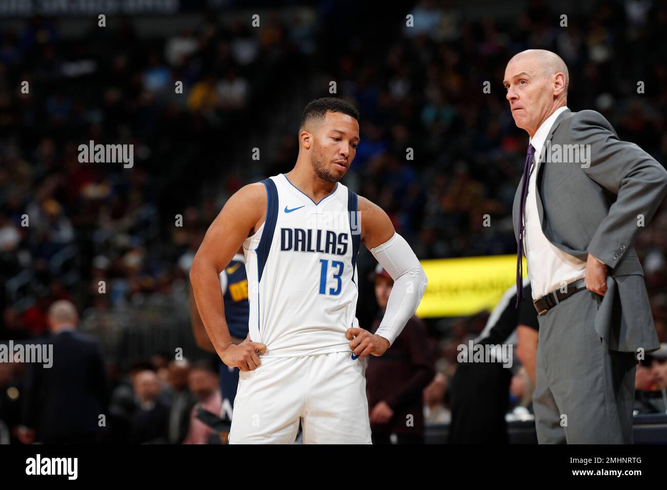 Dallas Mavericks guard Jalen Brunson (13) chats with head coach Rick ...
