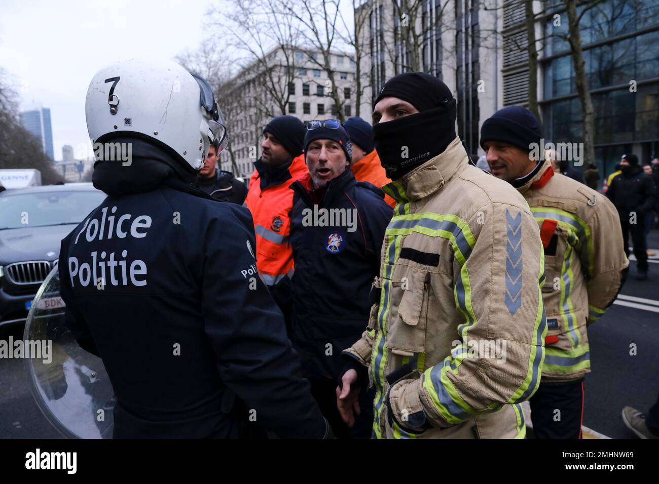 Brussels, Belgium. 27th Jan, 2023. Police officers stand guard as they ...