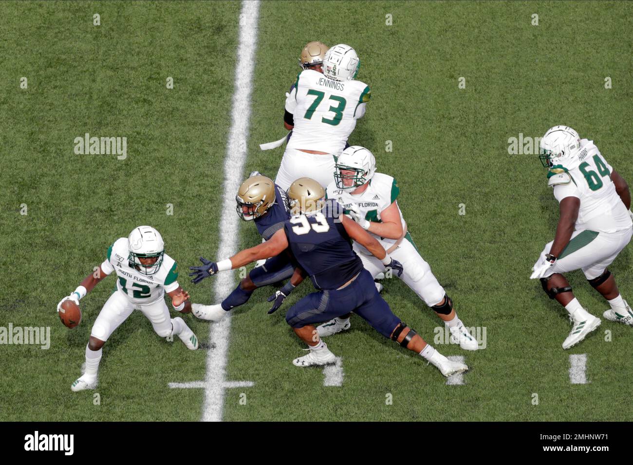 South Florida quarterback Jordan McCloud (12) scrambles against Navy ...