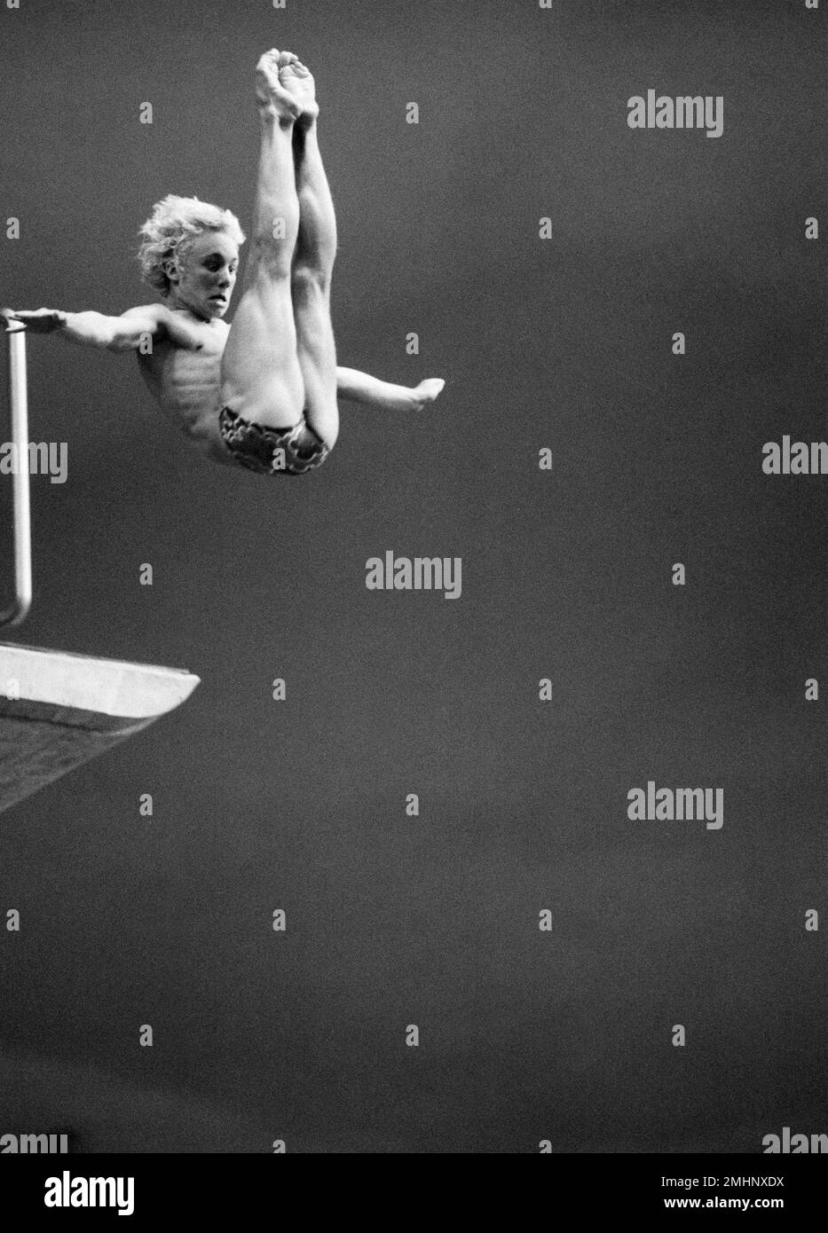 The Soviet Union's Sergei Nemtsanov executes a jackknife dive during ...